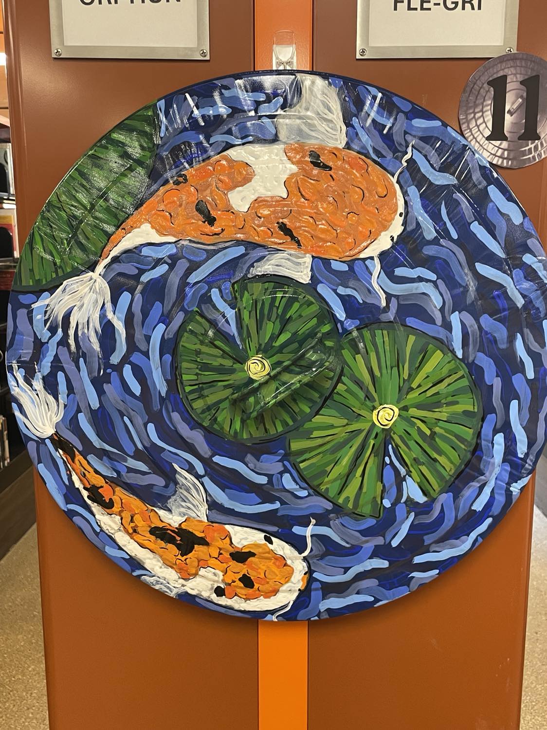 Trash Can Lid Art on Display – Shamokin-Coal Township Public Library